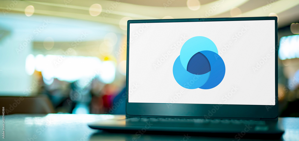 Computer with logo of Microsoft Dynamics 365 Customer Insights Stock ...