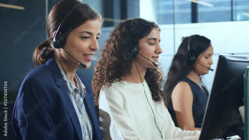 Young modern attractive smiling Indian Asian women or female crew of ...