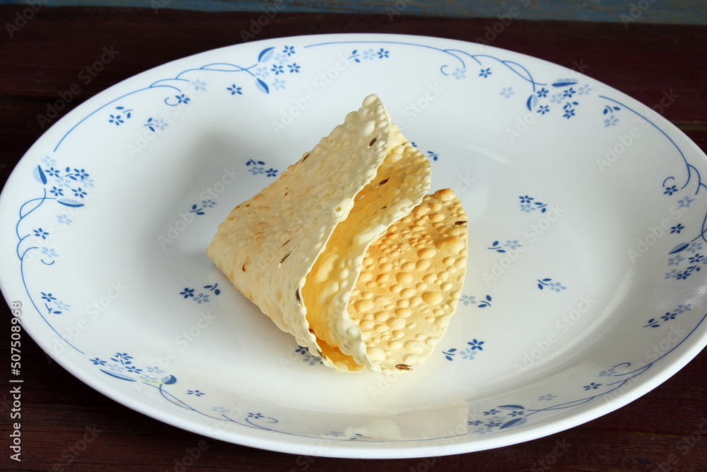 traditional indian gujarati food snack roasted jeera masala papad in ...