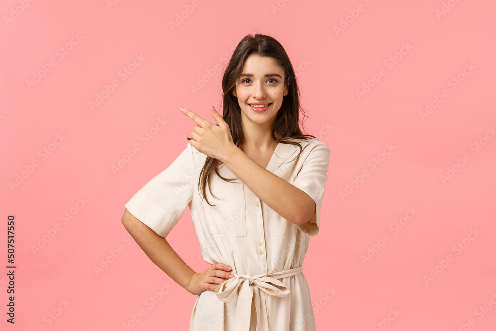 Optimistic gorgeous brunette caucasian female shoppaholic, pointing ...