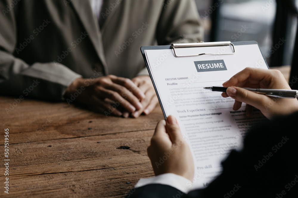 Person submitting resume to interview for a job with a company, Person ...