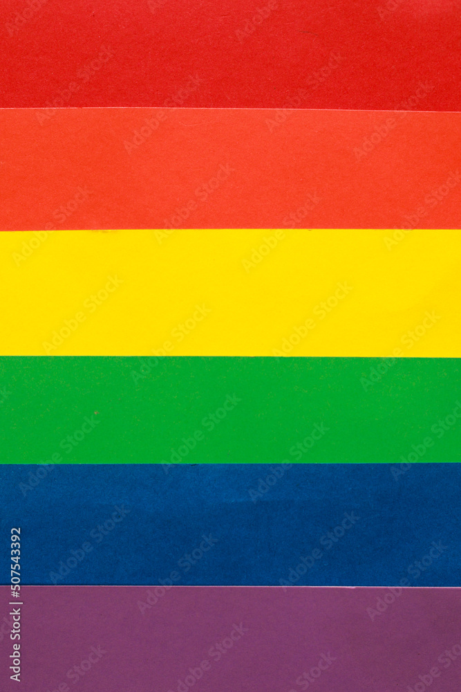 Rainbow LGBTQ or gay pride flag on colo paper texture. Abstract ...