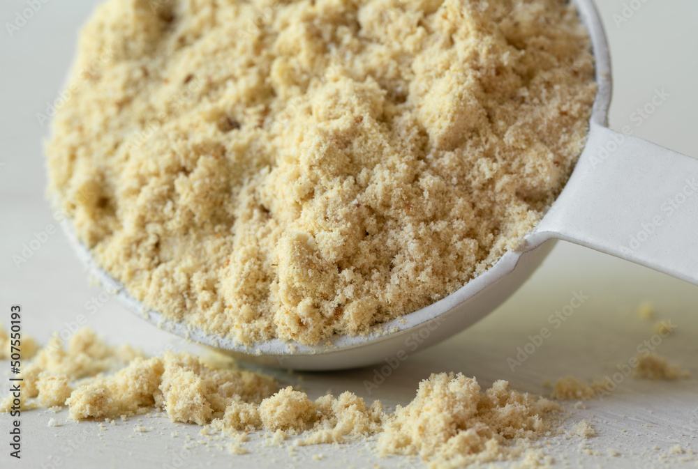 Vanilla Protein Powder Spilled from a Teaspoon Stock Photo | Adobe Stock