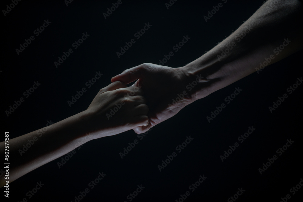 Helping hand outstretched, arm on salvation. Close up strong hand. Two ...