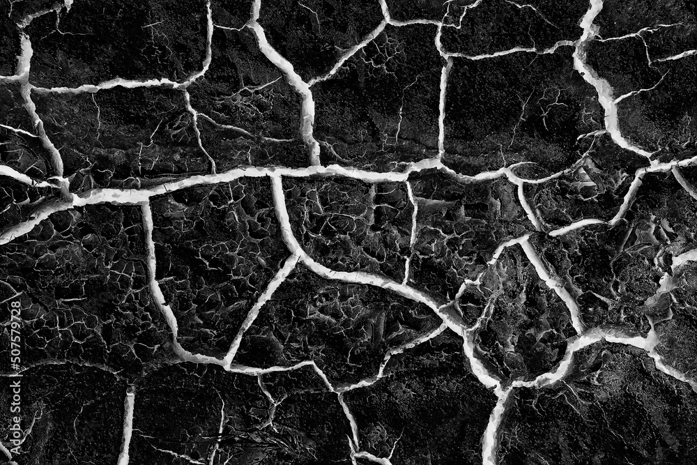 abstract black background with white cracks overlay ground cracked ...