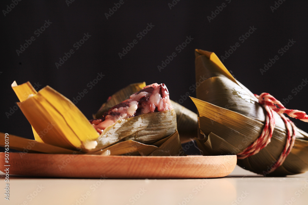 Rice dumplings, Glutinous Rice Wrapped in Bamboo Leaves Stock Photo ...