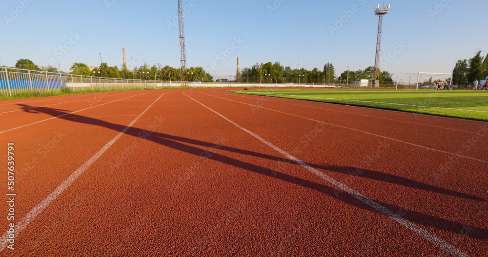 The Shadow of the Runner on Rubber Coating Treadmill. Sport Arena ...