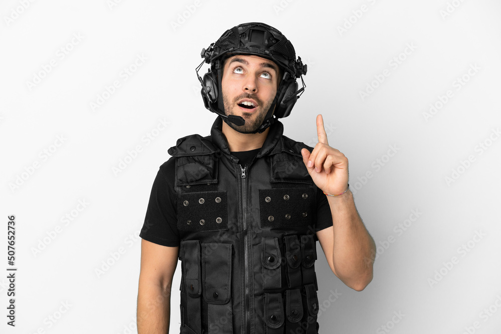 Young caucasian swat isolated on white background thinking an idea ...