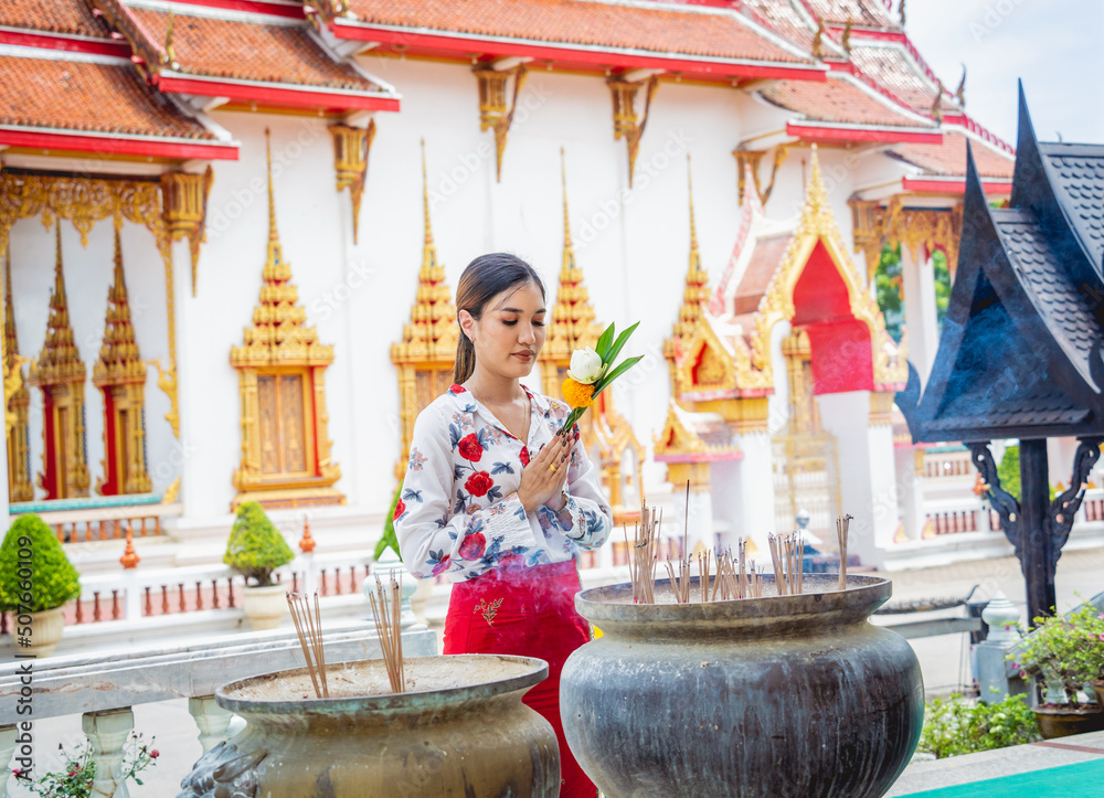 Beautiful Asian girl at big Buddhist temple dressed in traditional ...