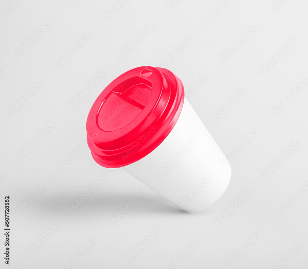 Takeaway paper cup on light background Stock Photo | Adobe Stock