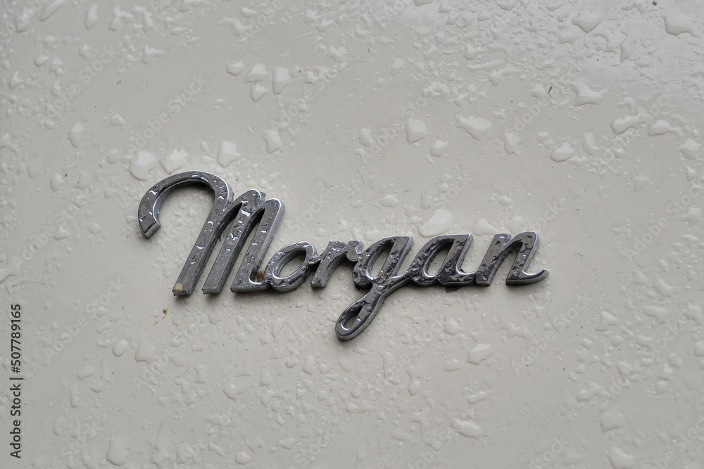 Morgan vintage sports car logo brand text on racing car exposed before ...