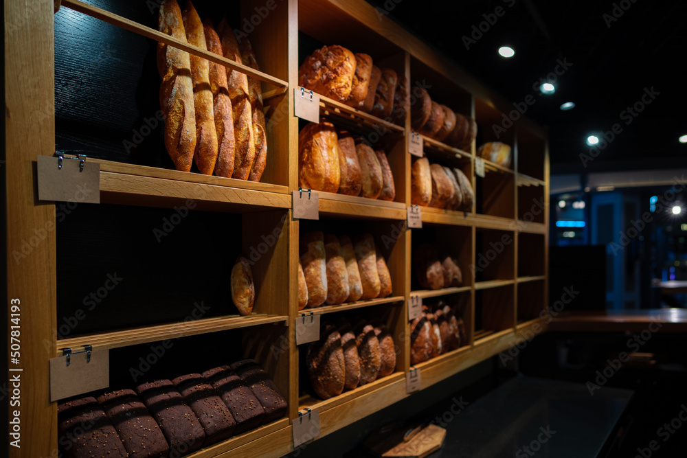 Bread to sell on counter in bakery shop Stock Photo | Adobe Stock