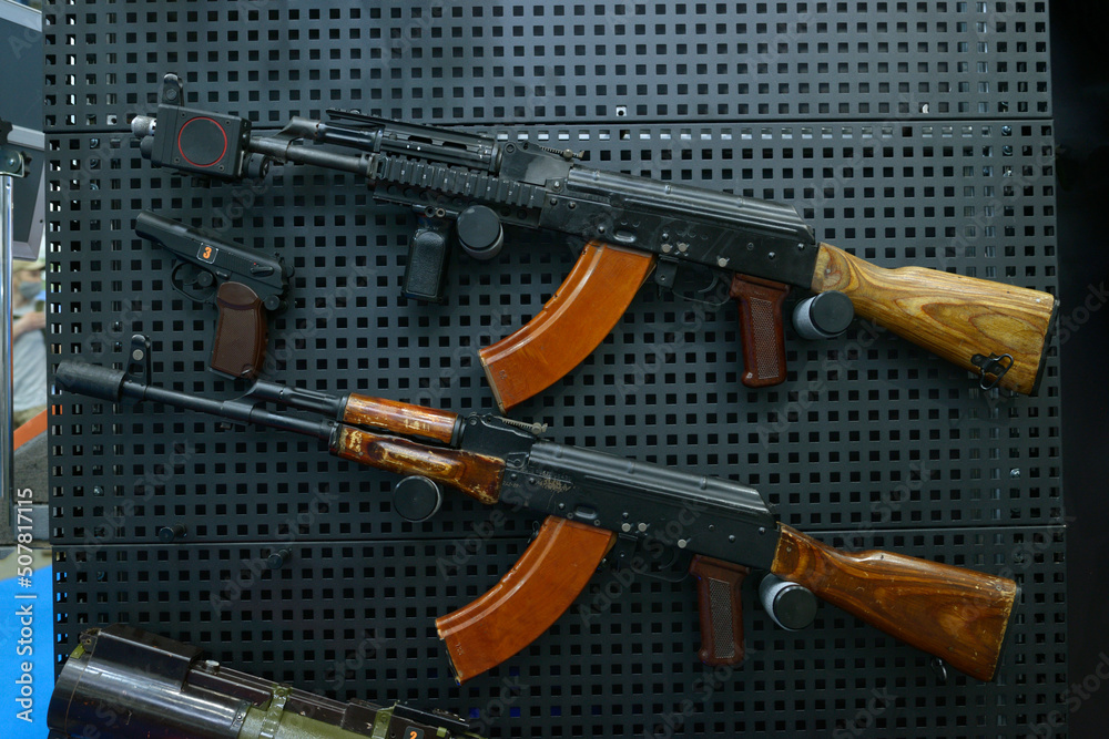 Assault rifles put on stand, gun shop Stock Photo | Adobe Stock