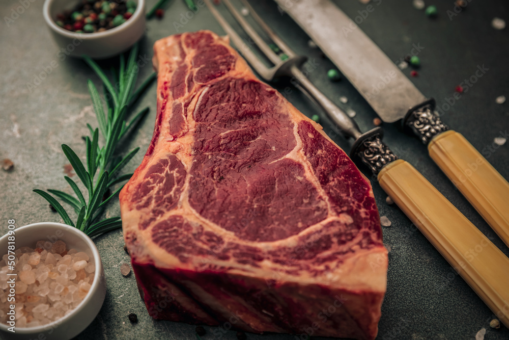 aesthetic picture of red meat with vintage cutlery and rosemary Stock ...