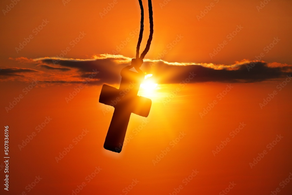 Classic wooden cross on color background Stock Photo | Adobe Stock