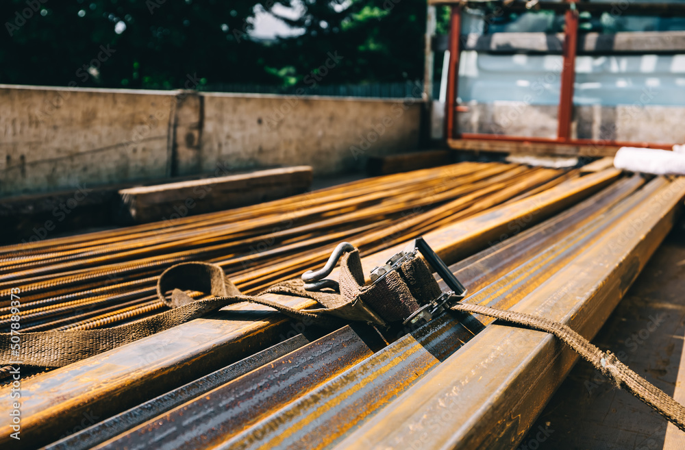 Steel profile tubes, corners and rods for the concrete reinforcing lies ...