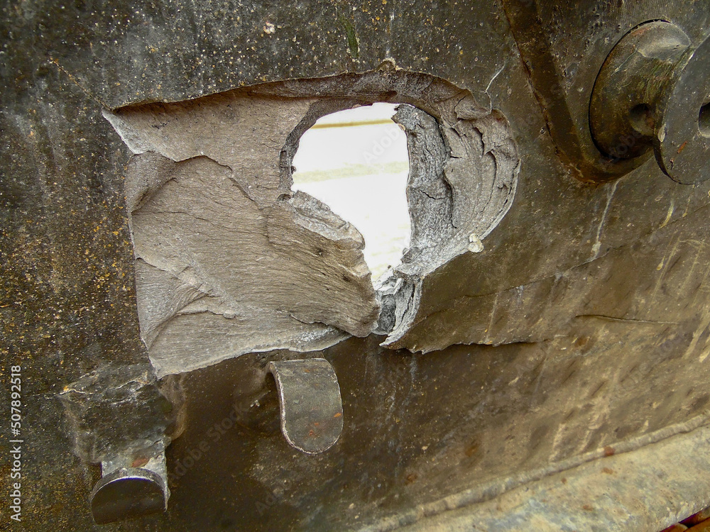 tank armor slashed by shrapnel from a wrecked tank, close-up Stock ...