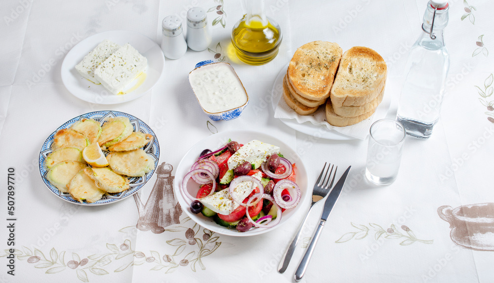 Greek food background. Ouzo, Greek salad, tzatziki, assortment of feta ...