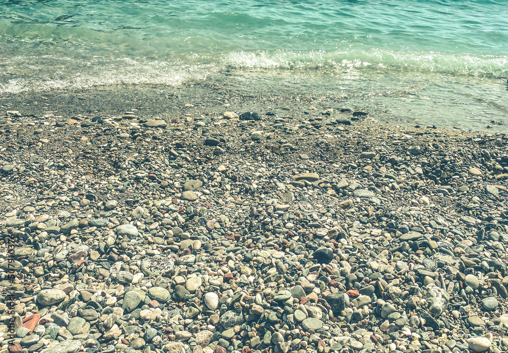 stones on the beach. pebble beach, seaside vacation, travel to a hot ...
