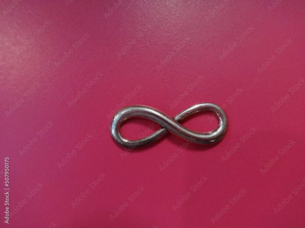 Infinity Symbol on a Pink Background Stock Photo | Adobe Stock
