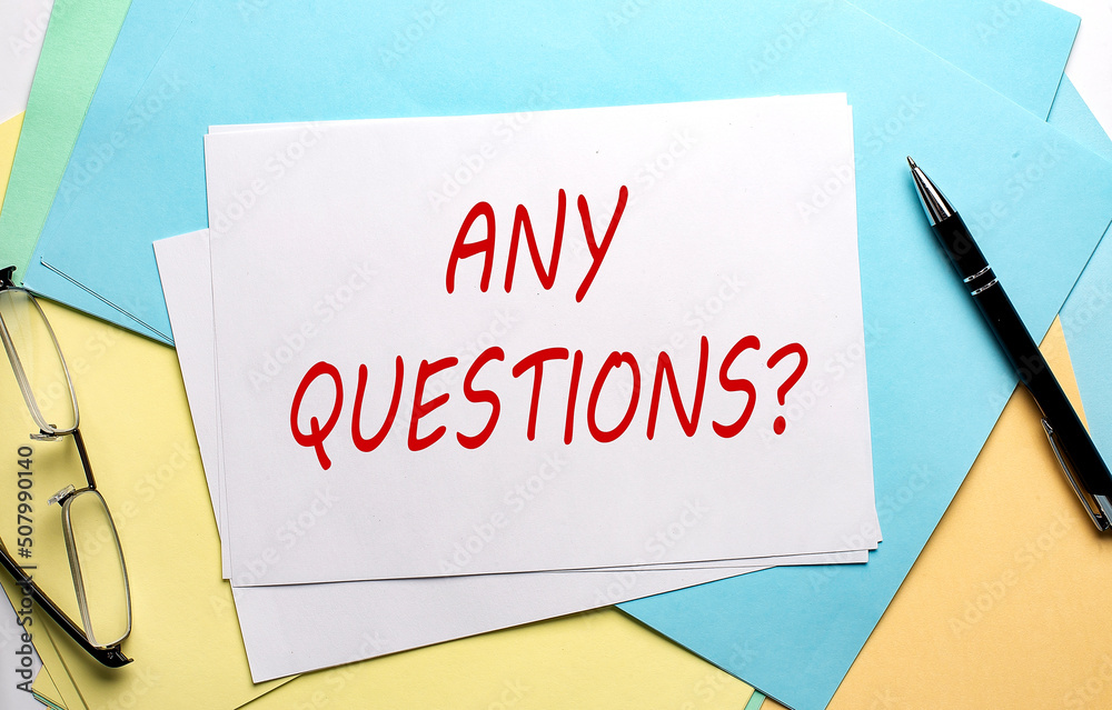 ANY QUESTIONS text on paper on the colorful paper background Stock ...