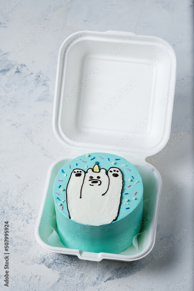 Bento cake for the holiday. A small cake with a picture or a ...