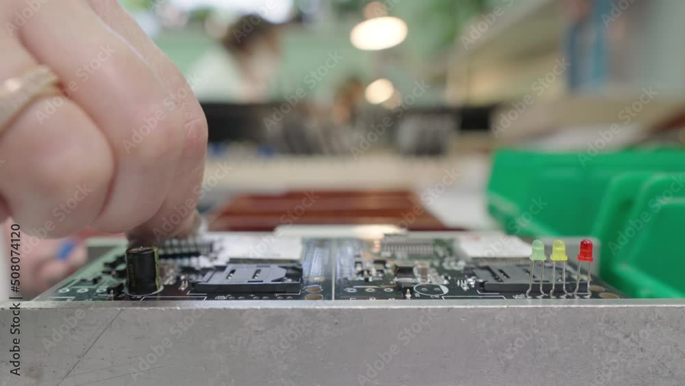 Placement of components on the soldering board. Electronics production ...