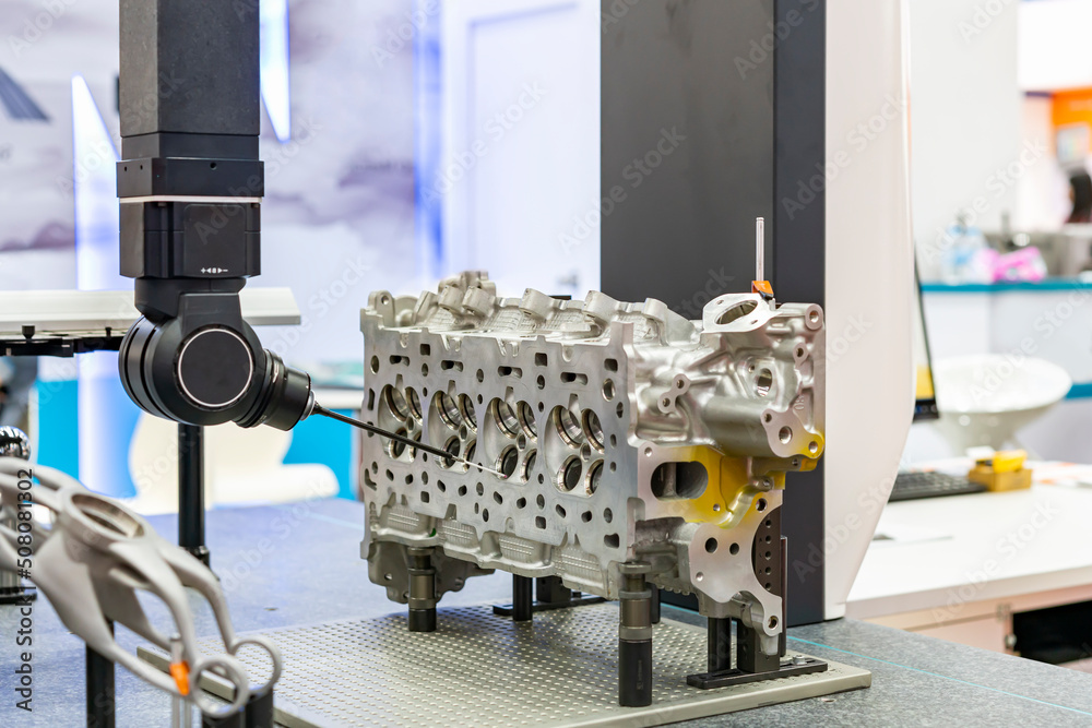 automatic coordinate measurement machine (CMM) during inspection ...