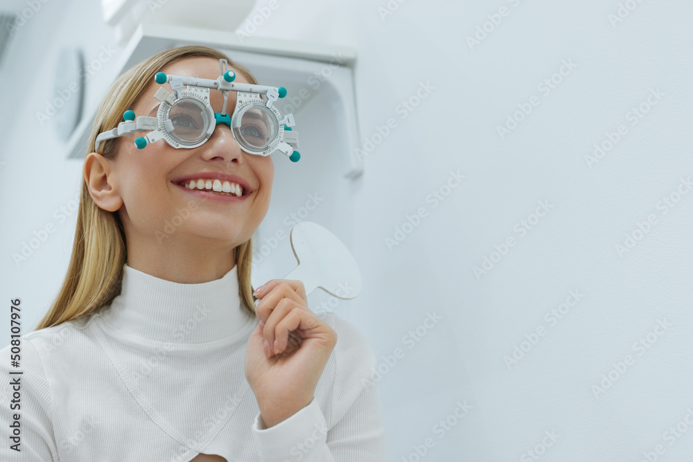 Eye Exam. Woman In Glasses Checking Eyesight At Clinic. Blonde Girl In ...