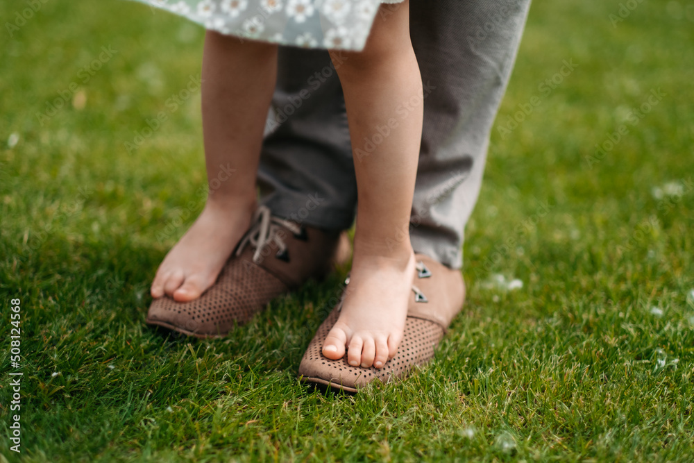 Father's Day. Happy family on a summer walk. Child and father together ...