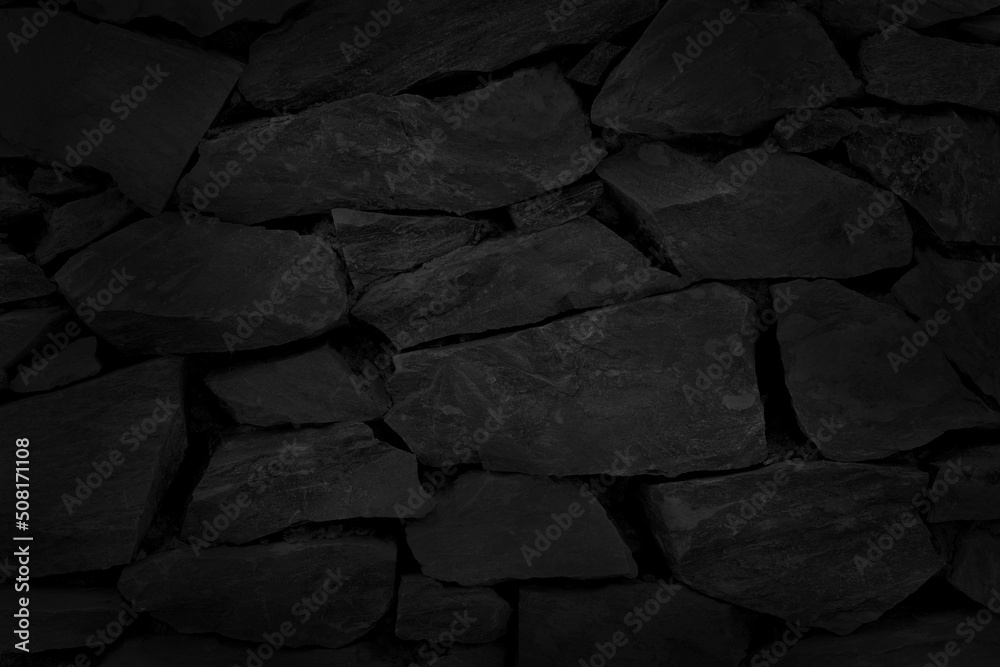 Black stone brick wall texture in natural pattern for background and ...