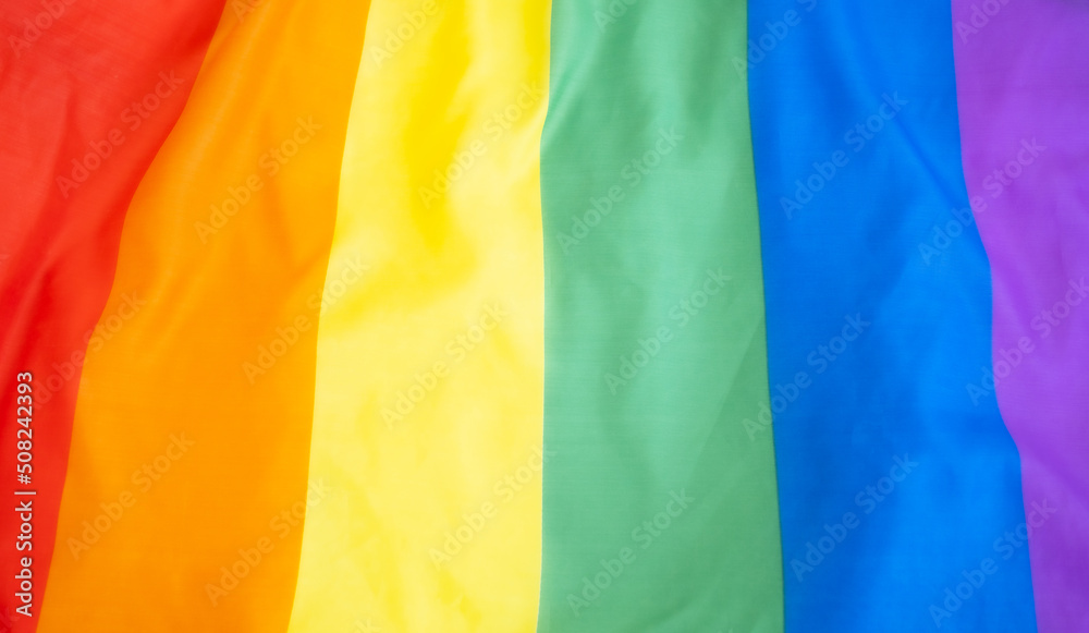 Rainbow flag as a background.LGBT,LGBTQ,LGBTQ+ concept.Homosextual and ...
