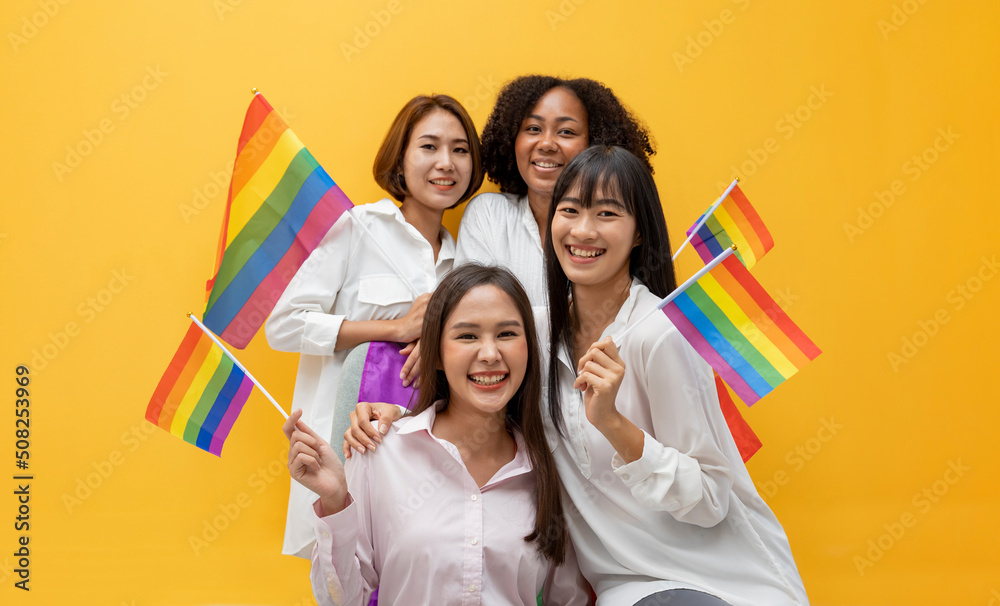 Group of diversity woman friends waving LGBTQ rainbow flag for pride ...