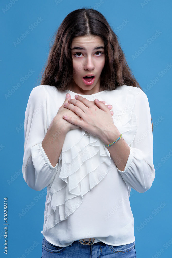 Shocked and appalled expression on a teenage girl, young teenager ...