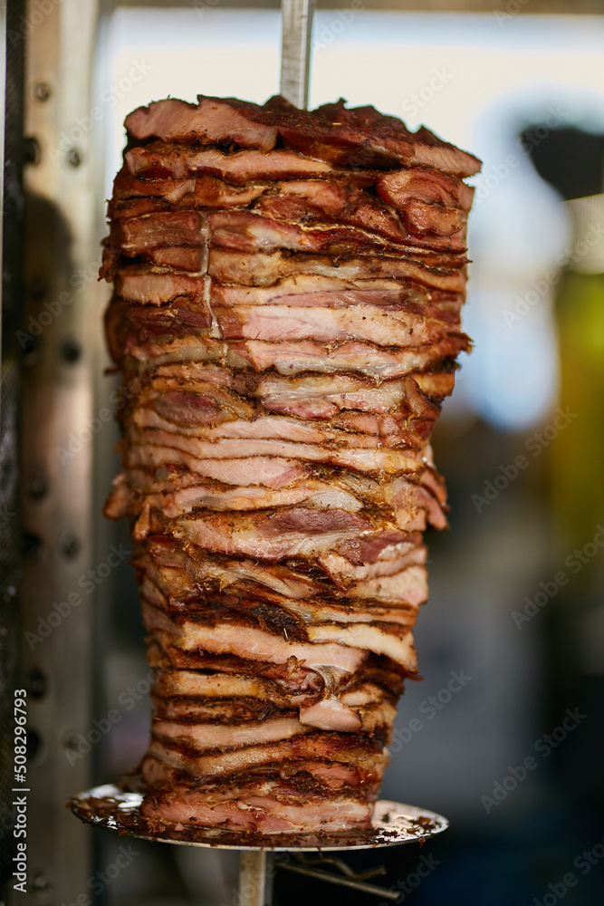 shawarma, lamb on a split. street food. Doner Kebab on a rotating spit ...
