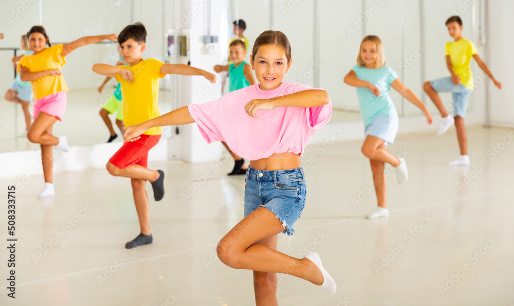 Active children dancing modern dances in a choreographic studio Stock ...