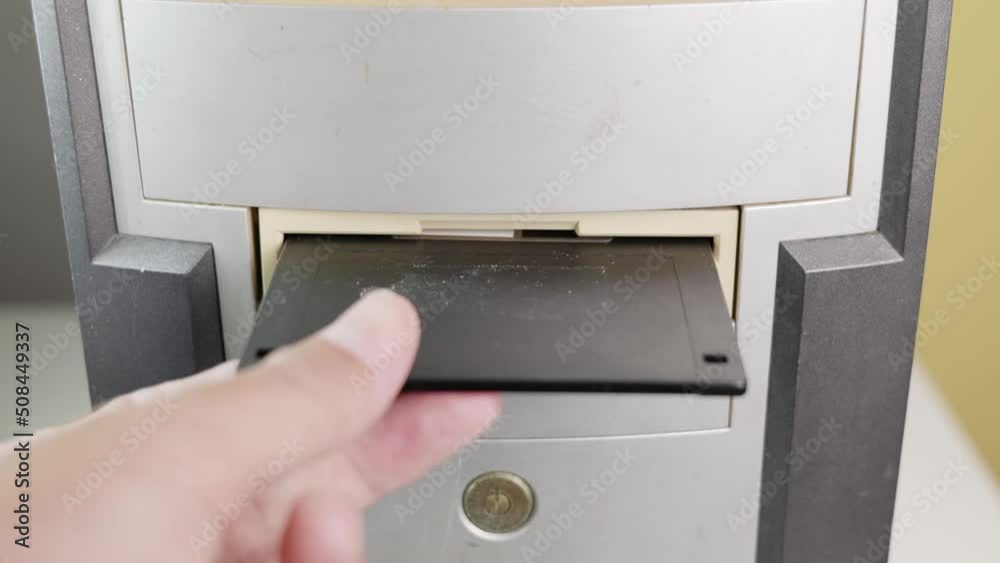 Hold the Floppy A disc and insert the reader. to read and write data It ...