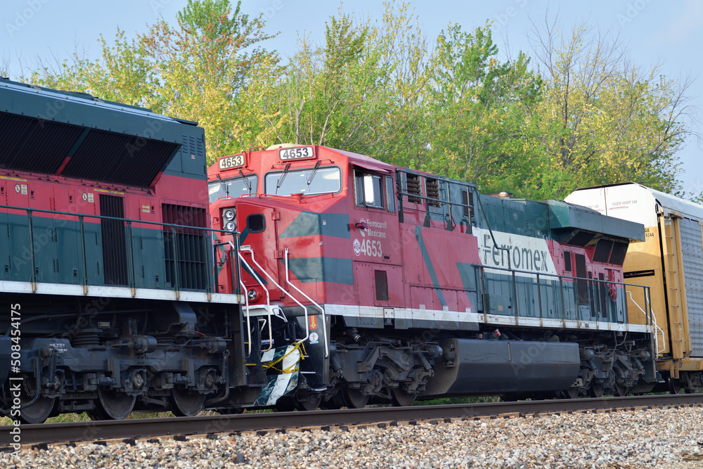 Locomotives, including Ferromex units, lead a Burlington Northern Santa ...
