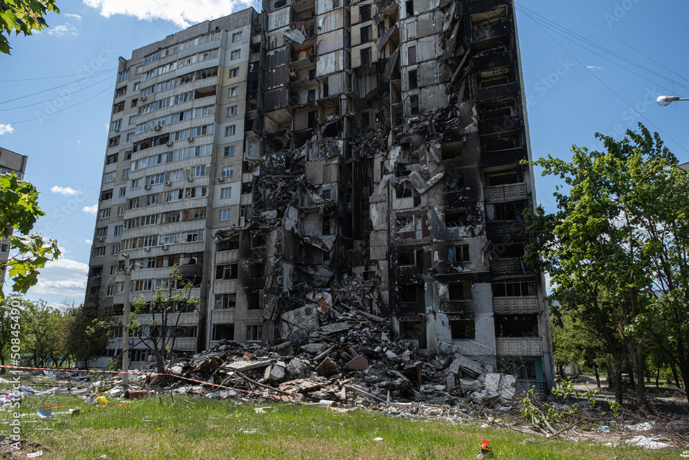 War in Ukraine 2022. Destroyed, bombed and burned residential building ...