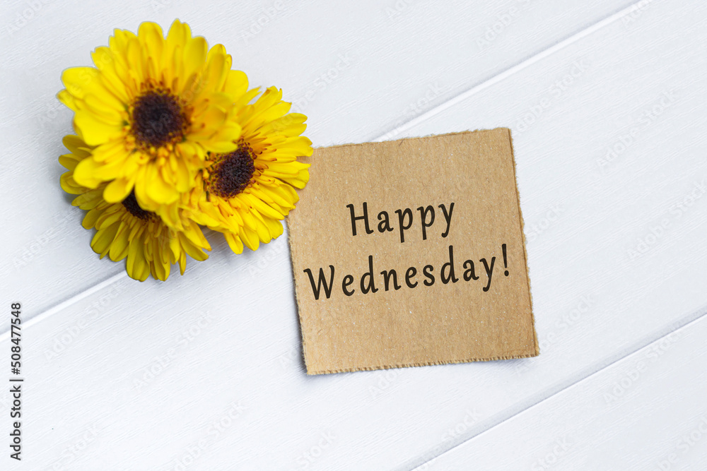 Happy Wednesday text on torn brown paper on white wooden table. Stock ...