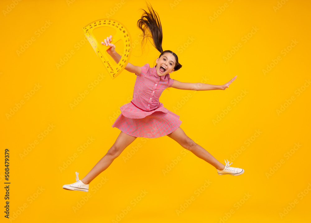 Amazed teenager. Teenager school girl study math or geometry lesson ...