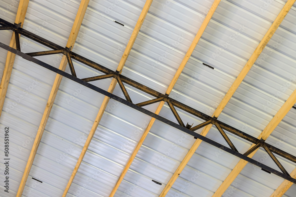 Construction site in metal roof of a warehouse center in storage ...