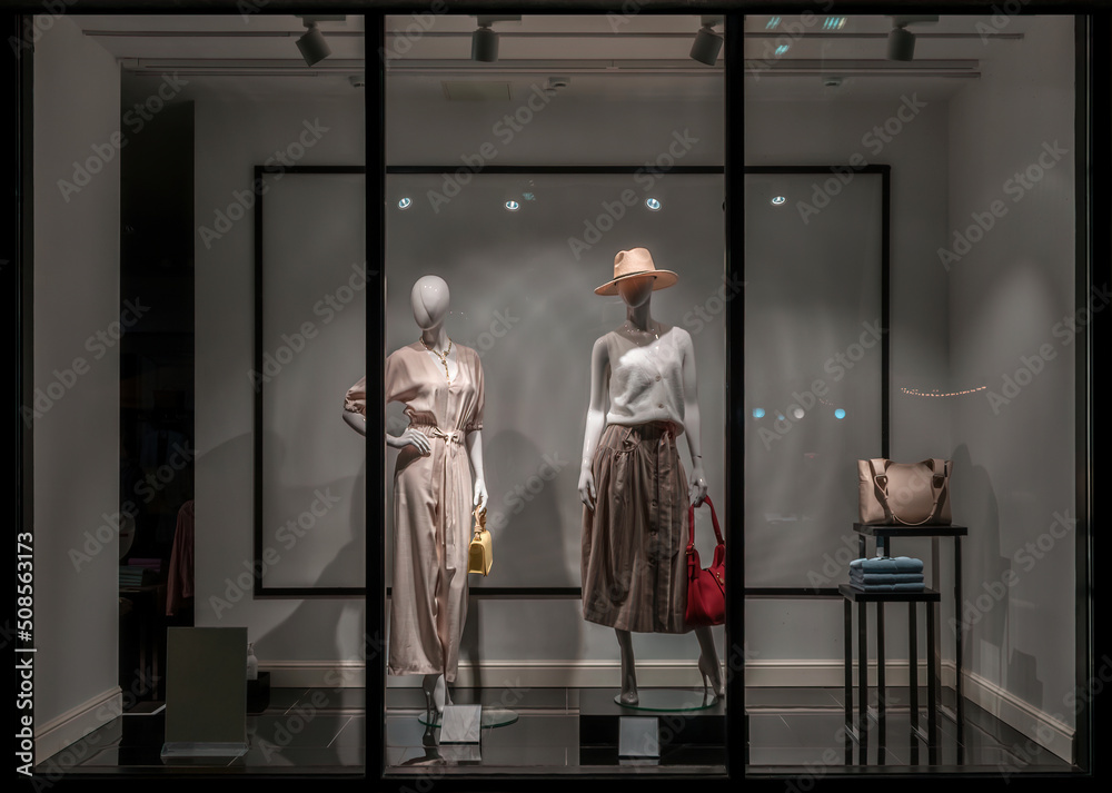 Shop windows and mannequins. Fashion Store exterior. City Night ...