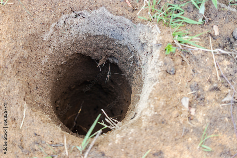 Foto Stock Deep pit in the ground. Digging a hole. Water Well Drilling ...