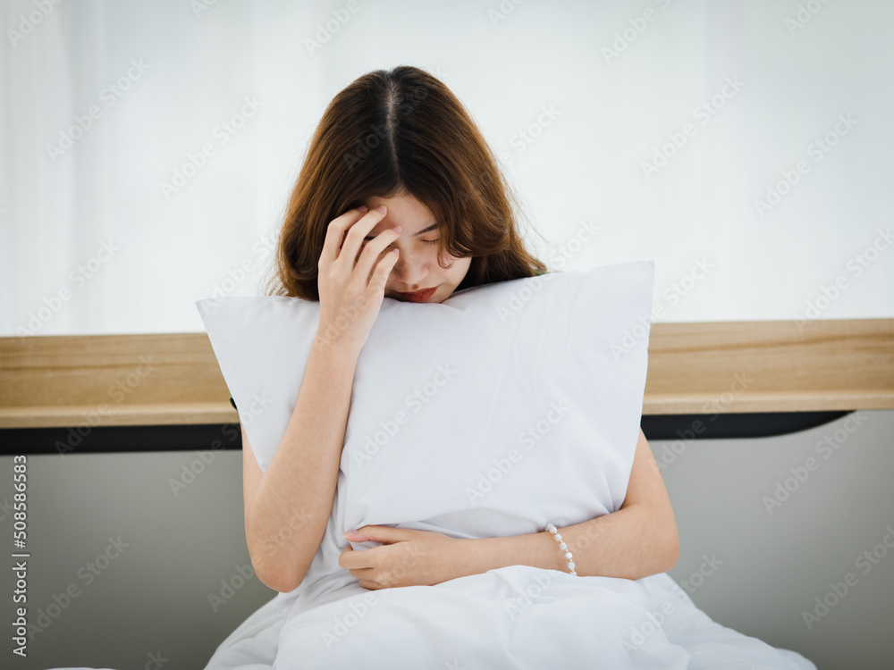 Asian stressed depressed worried upset sad frowning face young female ...