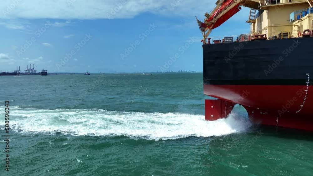 Propeller of large ship underwater spinning power working and water ...