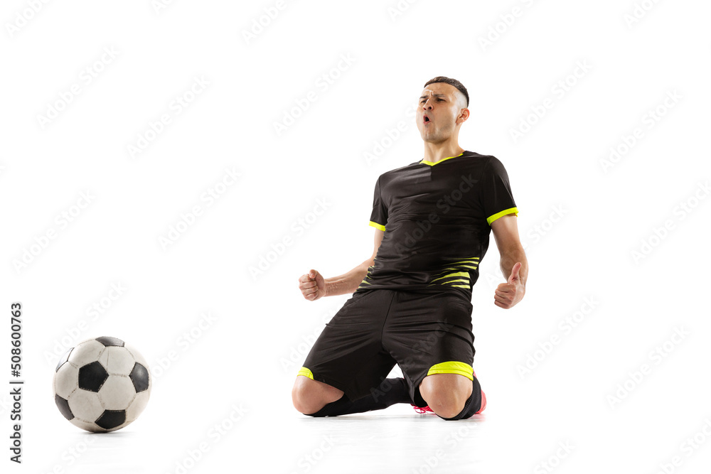 Win, success. Professional male soccer player in black football kit ...