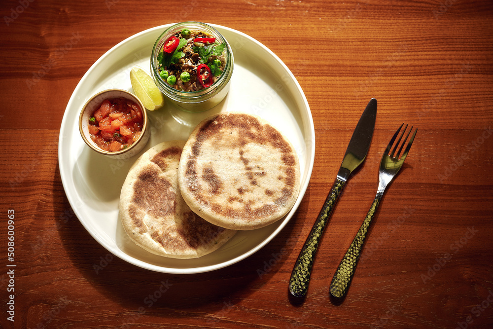 Roti Parata or Roti canai served with curry and sambal. Traditional ...