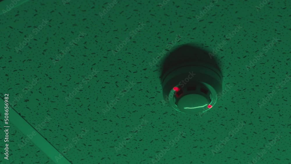 Fire Detection Sensor hangs on roof inside parking or office near ...