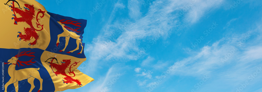 official flag of Kalmar, Sweden at cloudy sky background on sunset ...